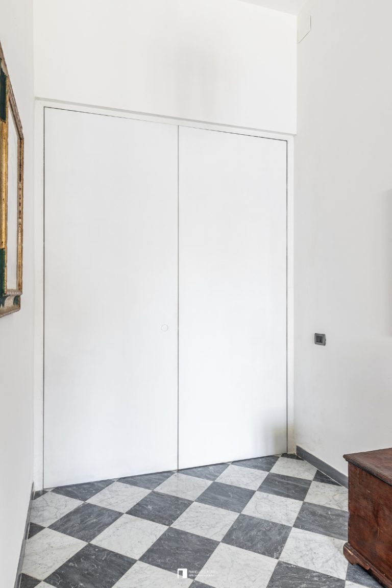 Invisible hinged door with folding doors | Invisible-door